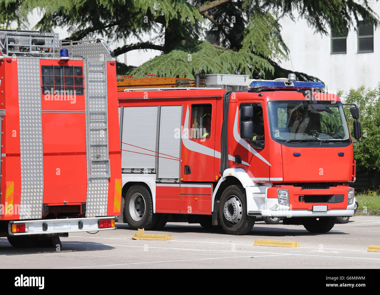 red truck fire engines firefighters during a fire drill training Stock ...