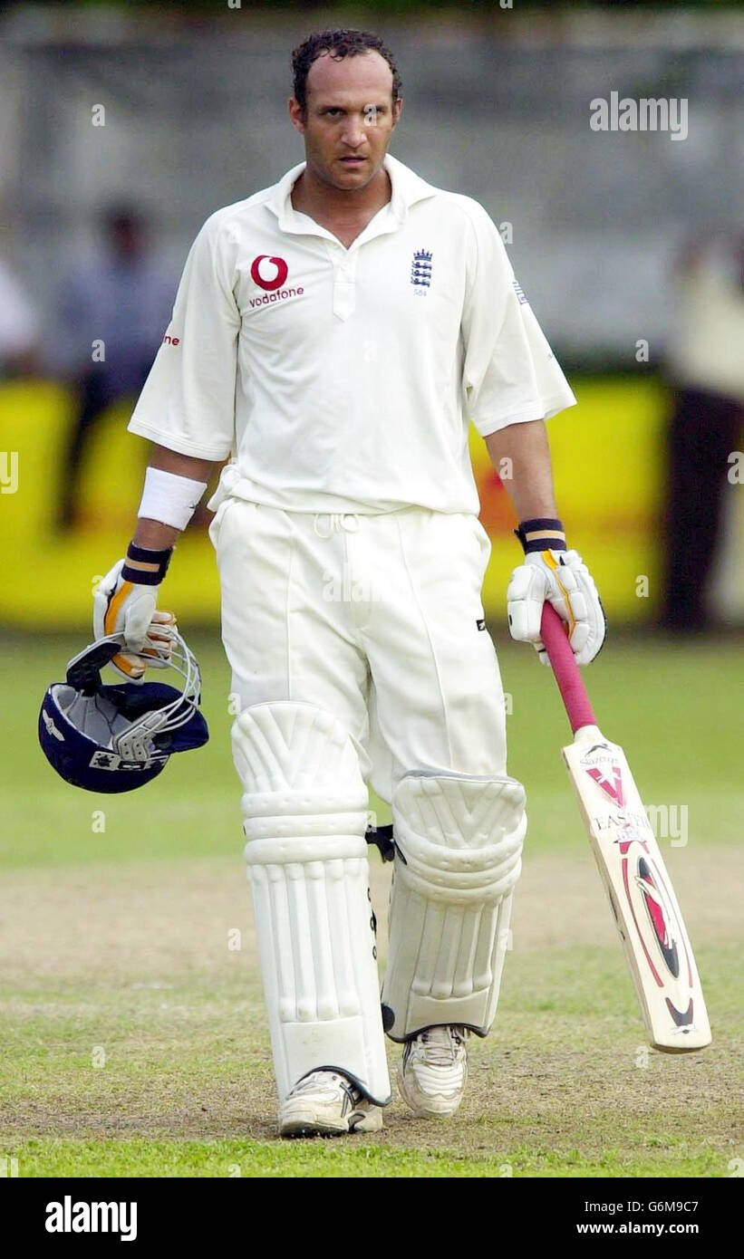 England batsman Mark Butcher takes a break on his way to scoring 105 ...