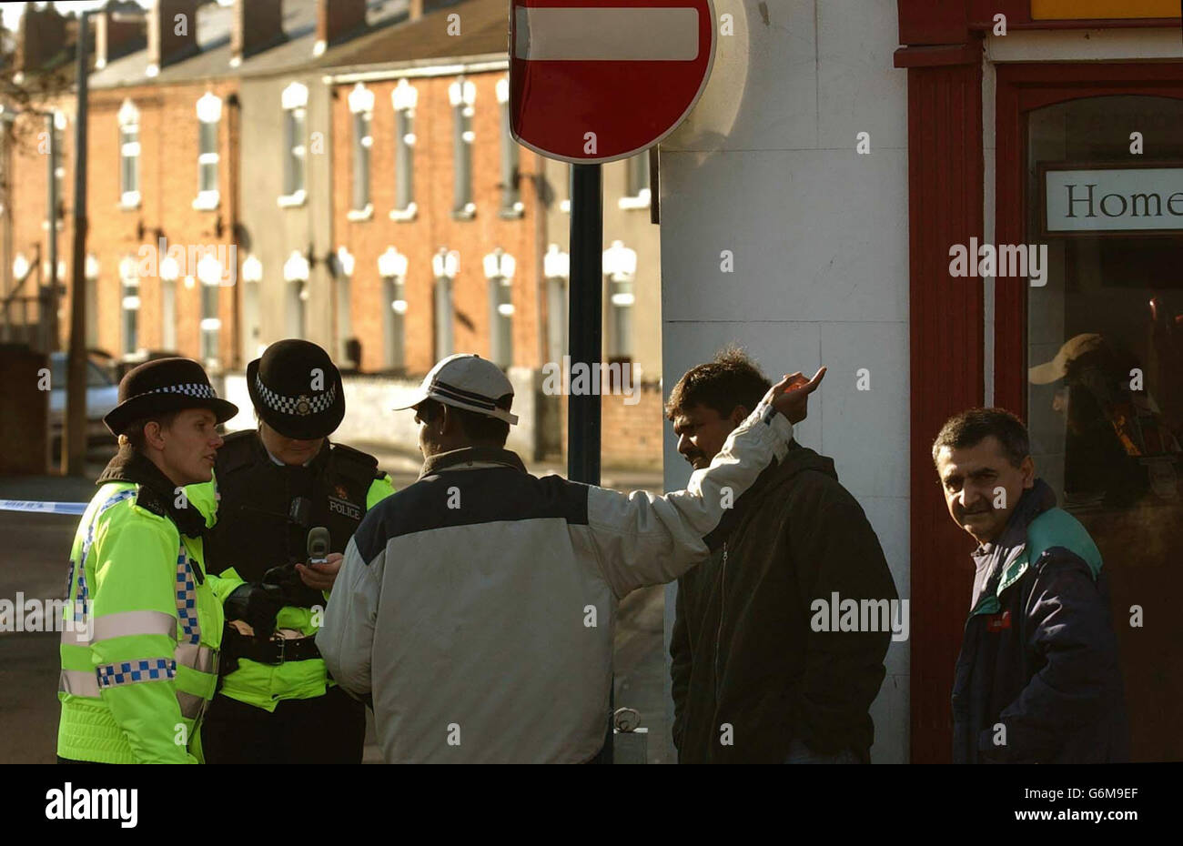 Police talk with local residents at the end of the blocked off St James ...
