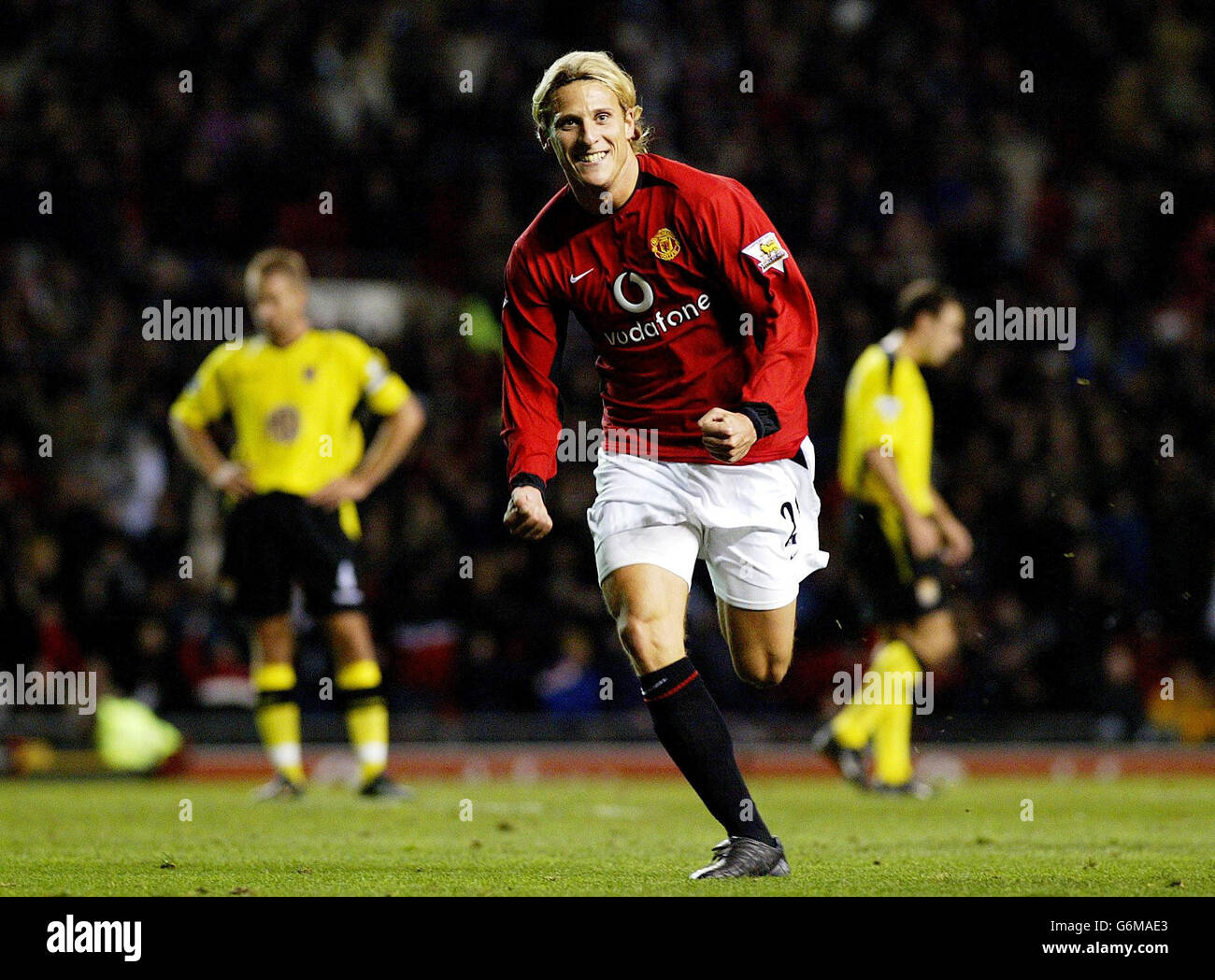 Manchester United's Diego Forlan celebrates scoring the fourth goal ...