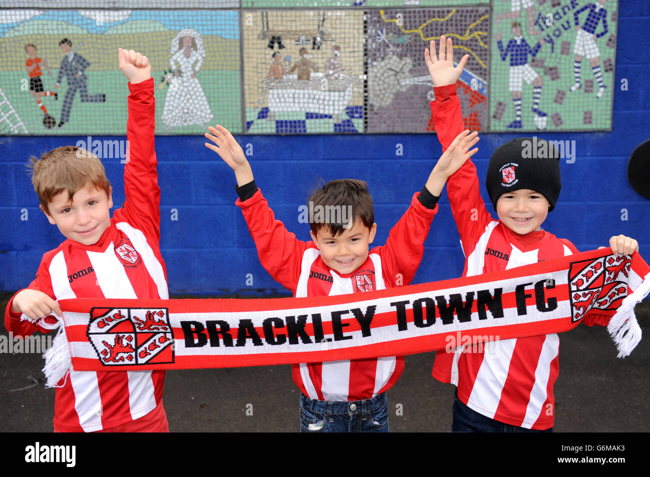 Young Brackley Town fans show their support outside the ground before ...
