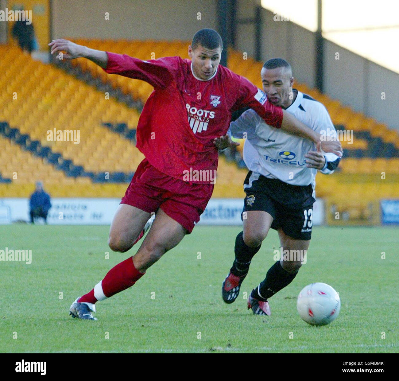Scarborough's Ashley Sestanovich forcing his way past Port Vale's Levi ...