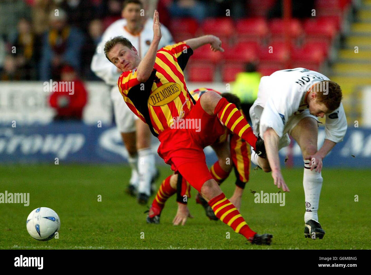 Partick's Derek Fleming (left) collides with Stephen Pearson of ...