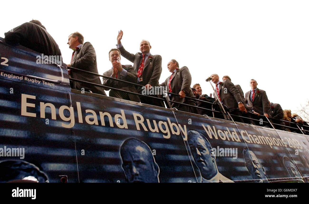 Members of the England World Cup party wave to the crowds on the ...