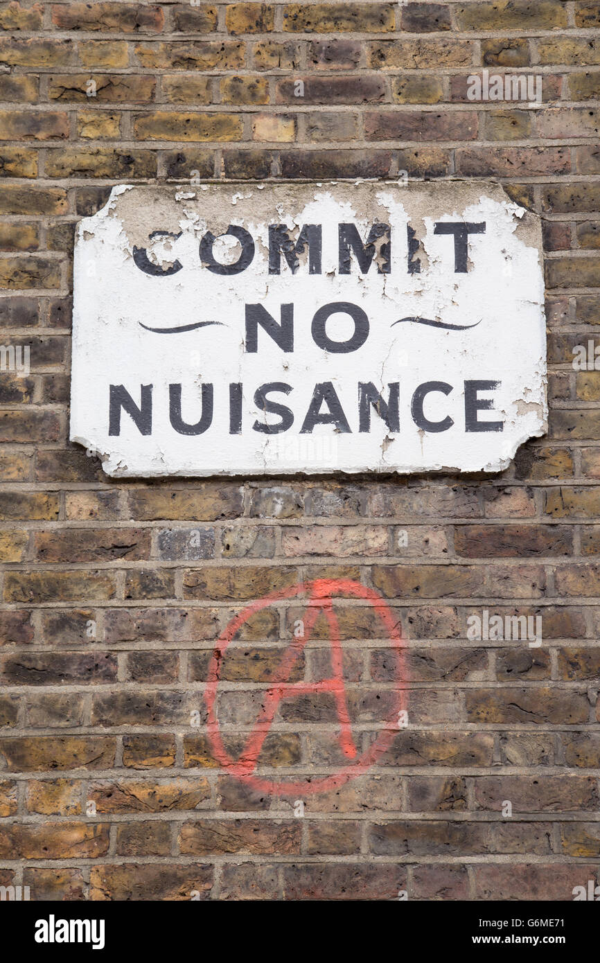 Old sign saying "Commit no nuisance" on the rear wall of the Welsh ...