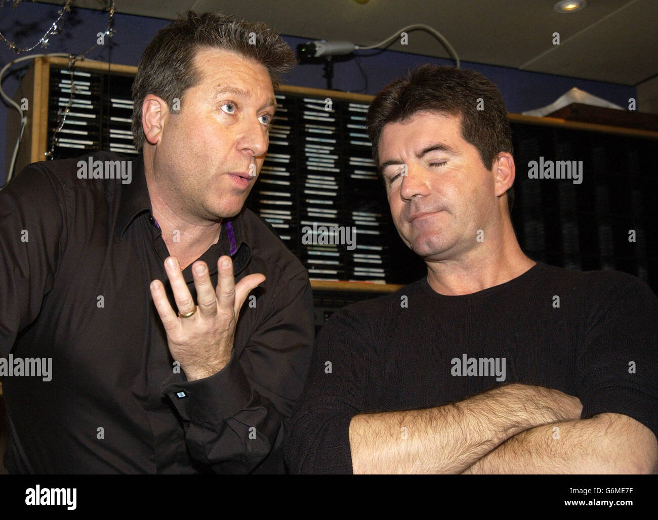 Presenter of the show, DJ Neil Fox (left) and guest Simon Cowell ...