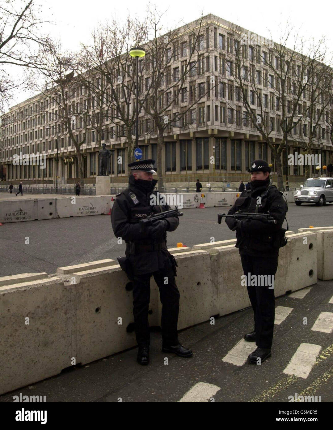 Armed police guard the US Embassy Stock Photo - Alamy