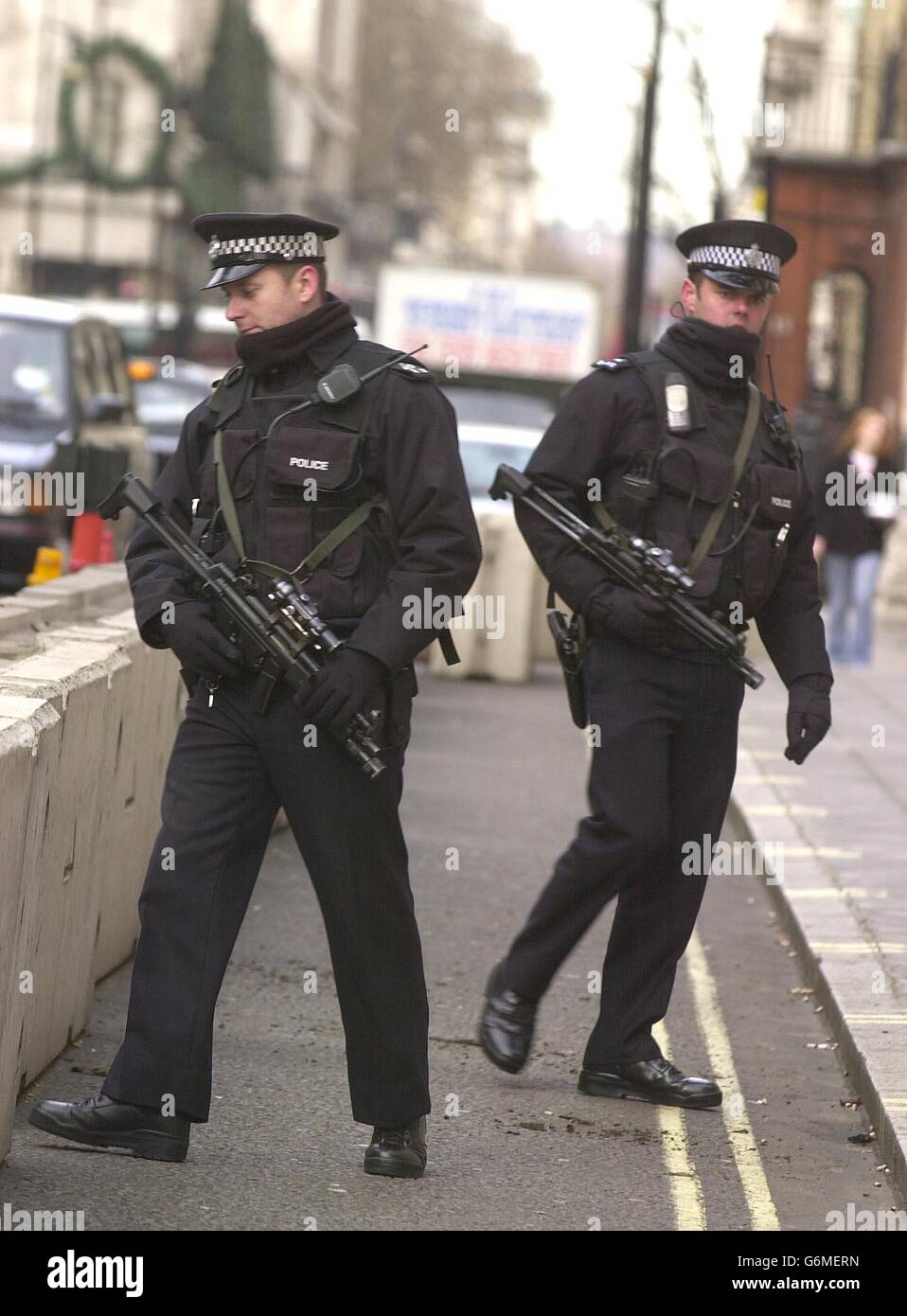 Armed police guard the US Embassy Stock Photo - Alamy