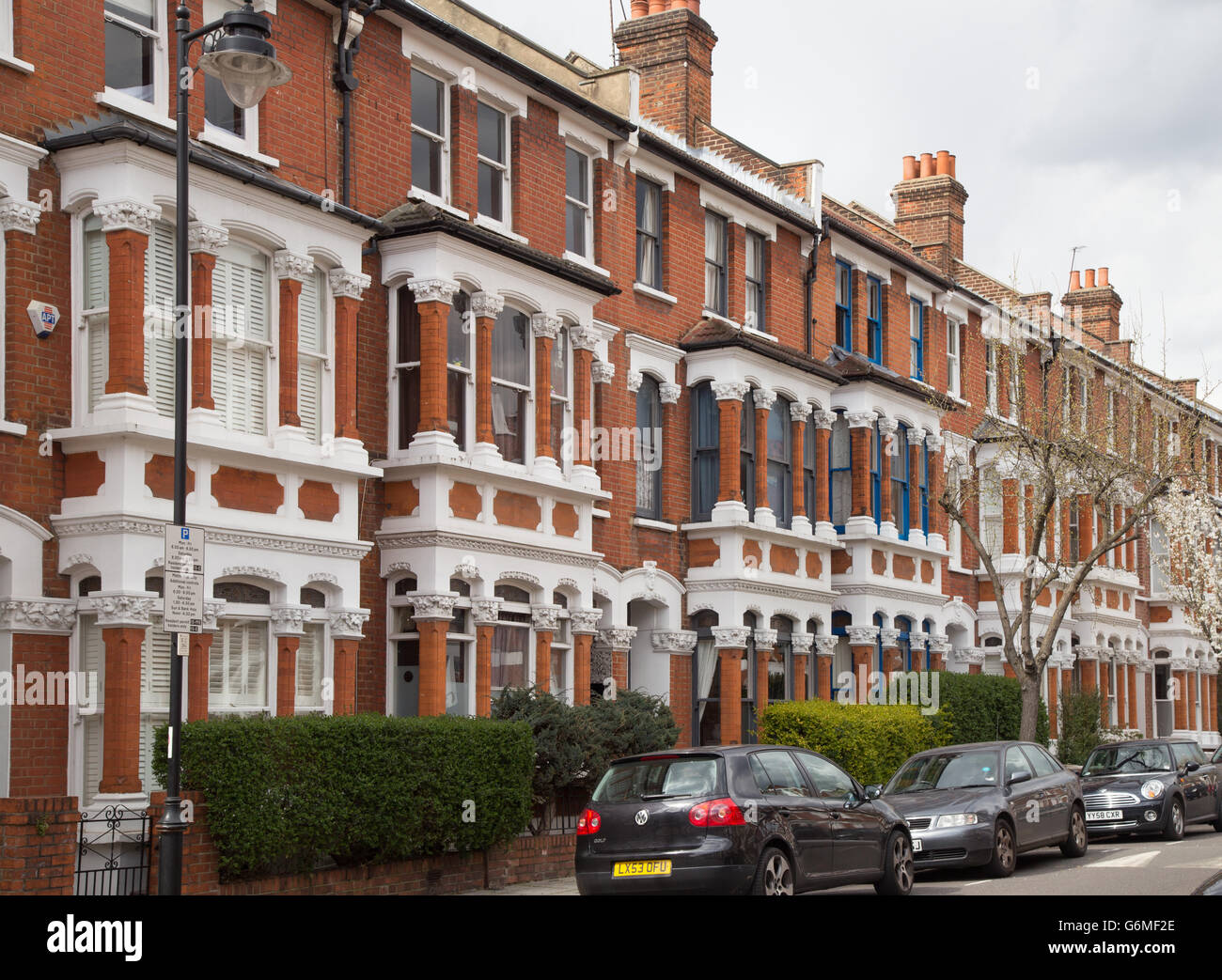 exterior of Victorian red-brick townhouse facades on Calabria Road in ...