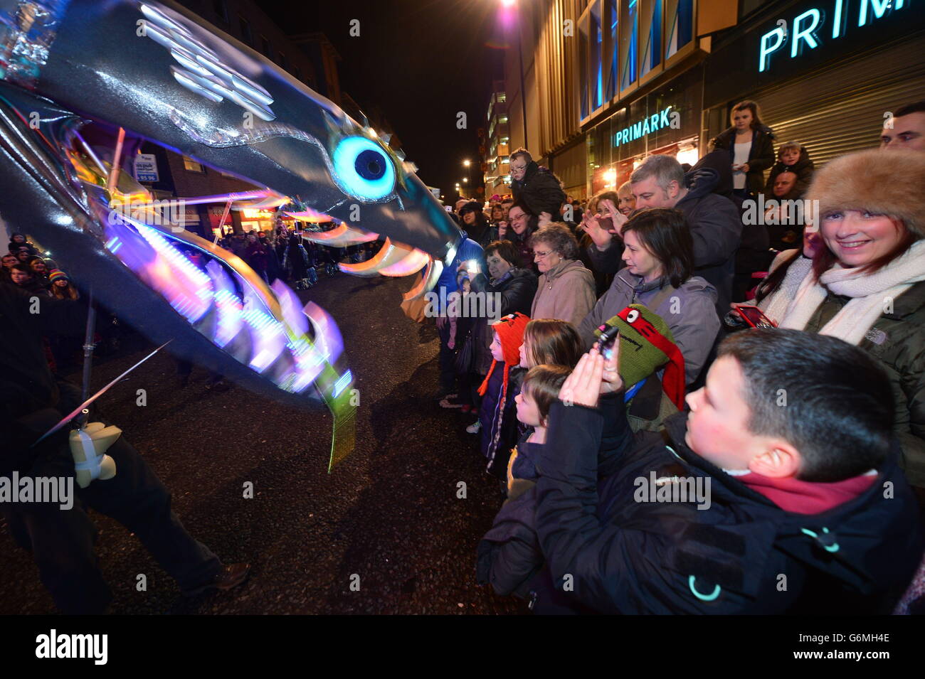 Crowds watching performers at the New Year's eve Winter Carnival in ...