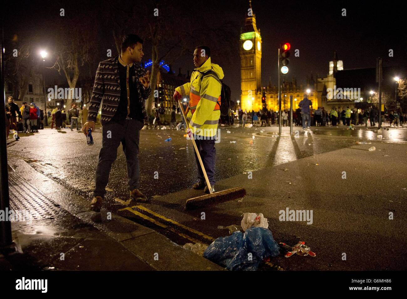 The clean up begins in central London after the New Year celebrations ...