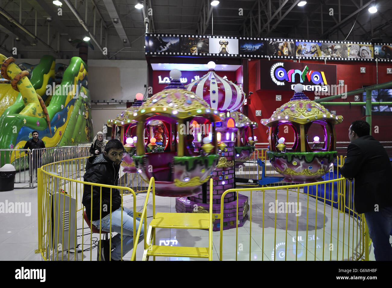 A fairground ride in the entertainment zone inside the Mansour Mall in ...