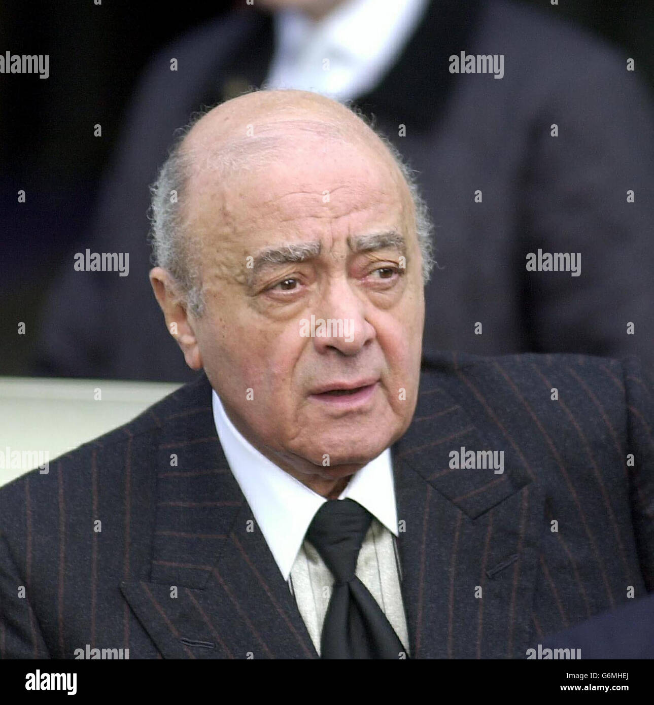 Mohamed al Fayed arriving at the Queen Elizabeth II conference centre ...