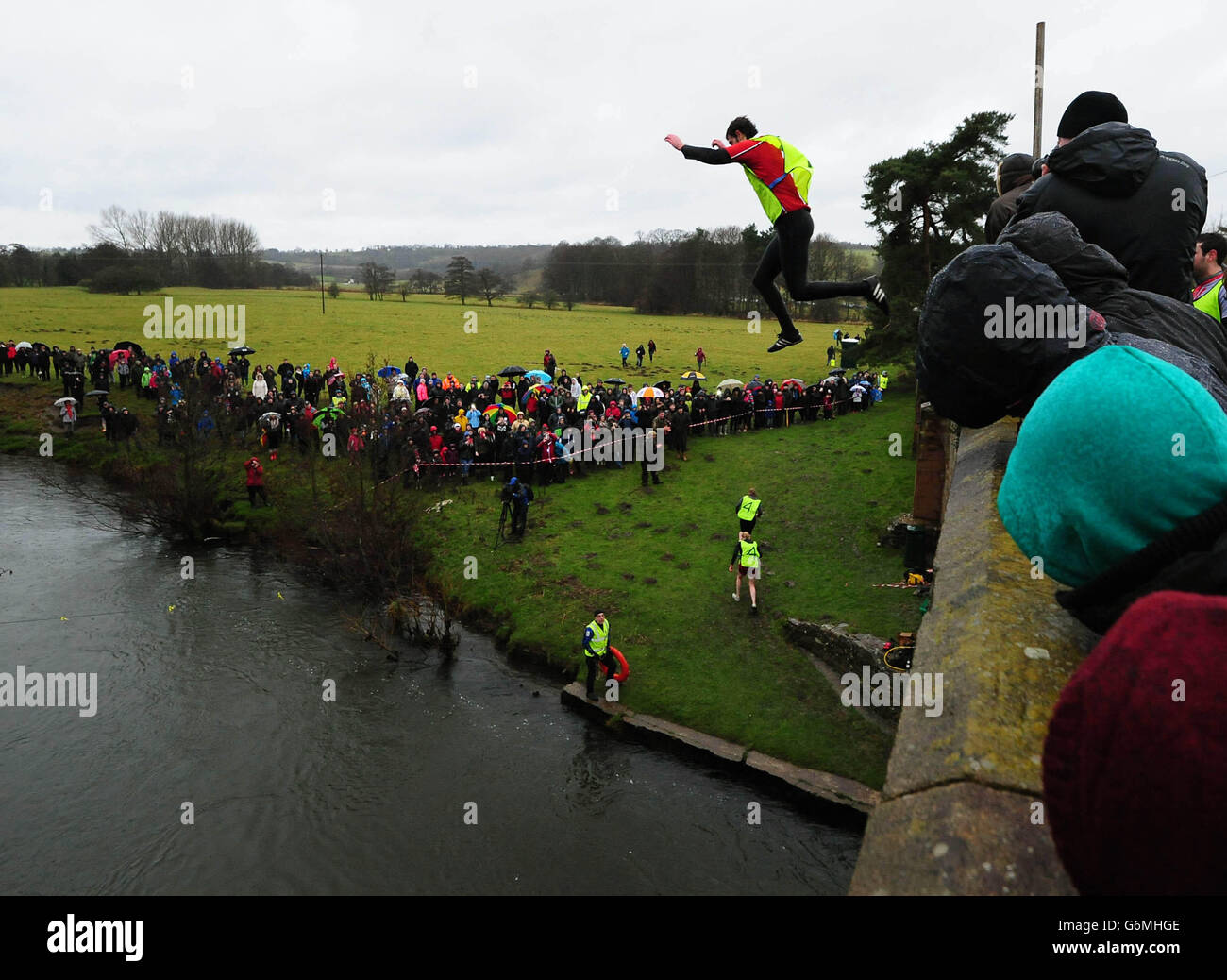 A charity competitor jumps 30ft off of Mapleton Bridge into the River ...