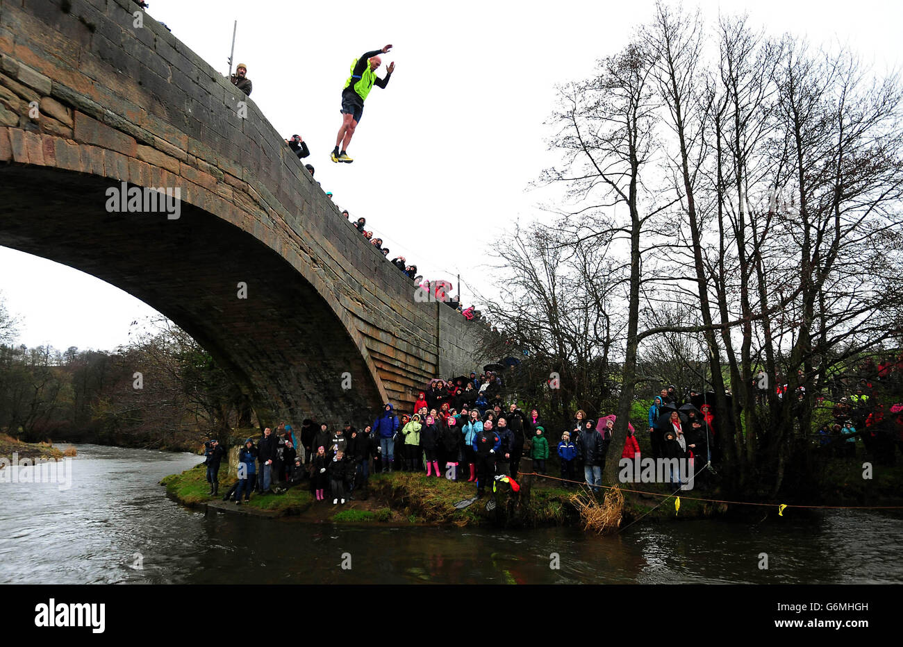 A charity competitor jumps 30ft off of Mapleton Bridge into the River ...