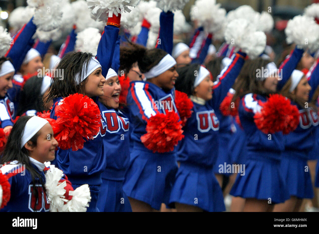 Cheerleaders from the Universal Cheerleaders Association (UCA) take ...