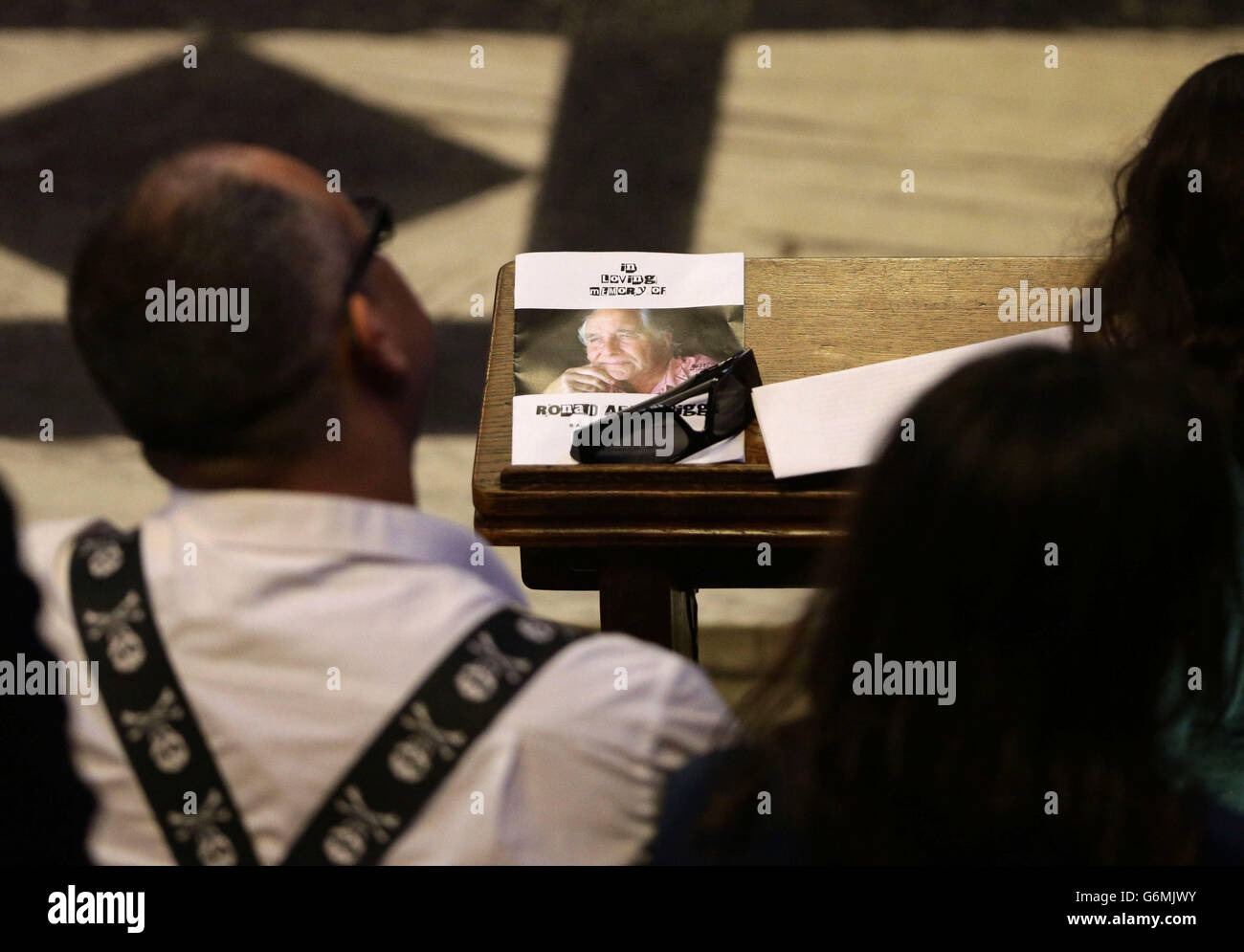 Son Michael Biggs (left) with his family during the funeral service of ...