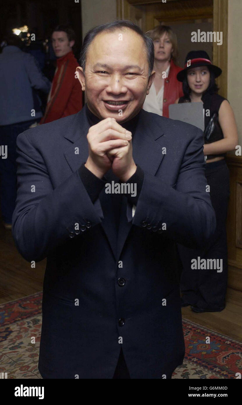 Director John Woo arrives for the screening of his latest film Paycheck ...