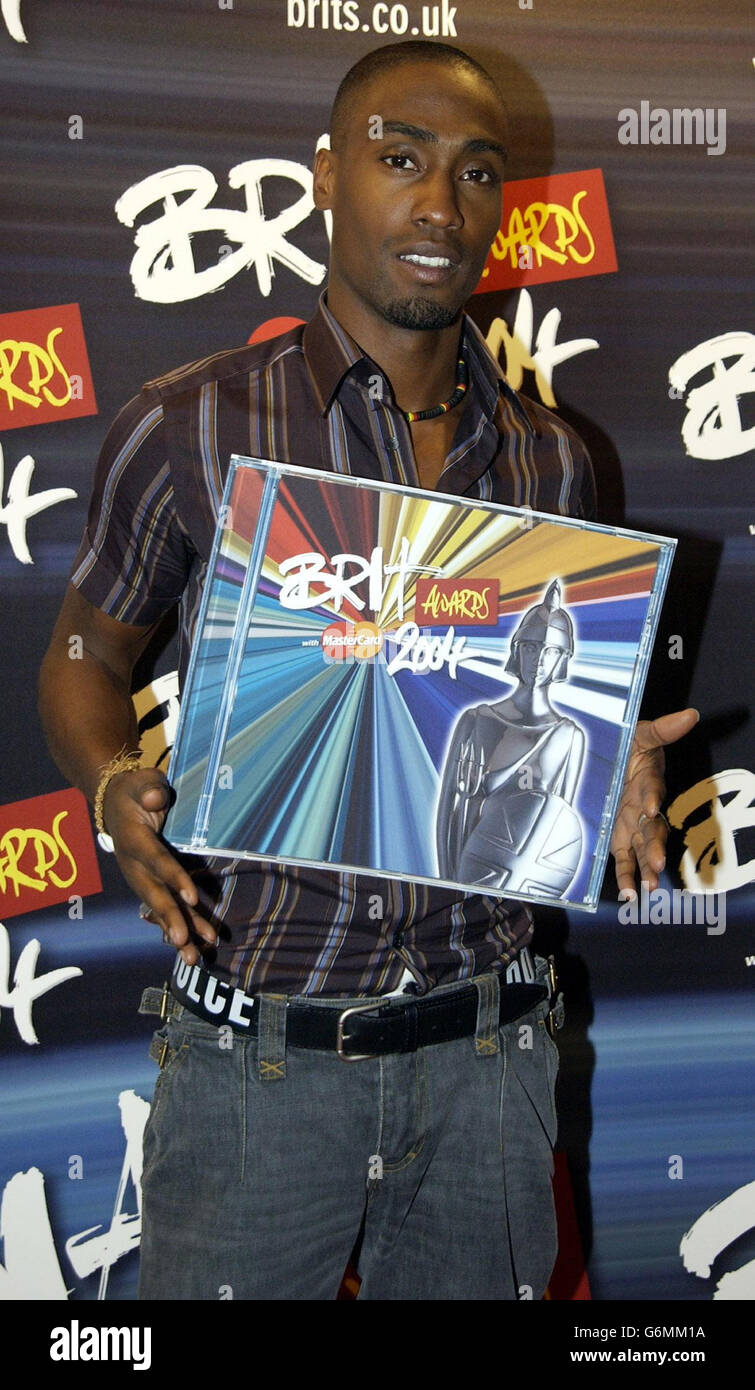 Singer Simon Webbe from the boyband Blue arrives for the BRIT Awards ...