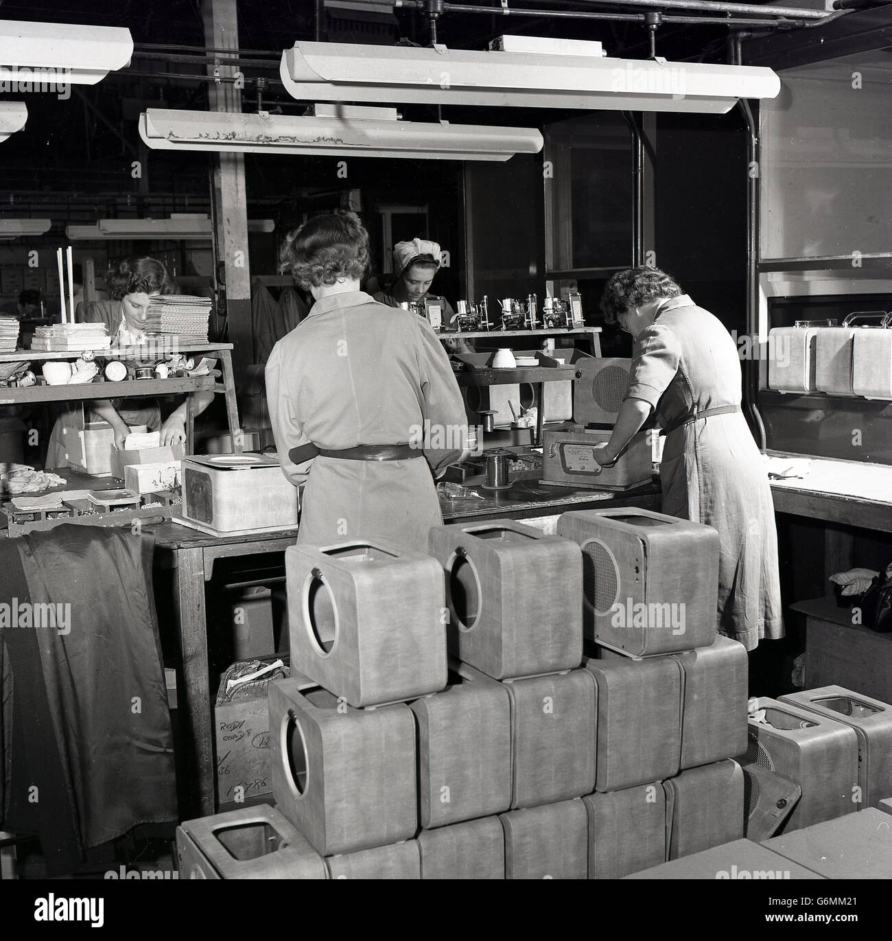 1950s, historical, women working in a radio manufacturing factory ...