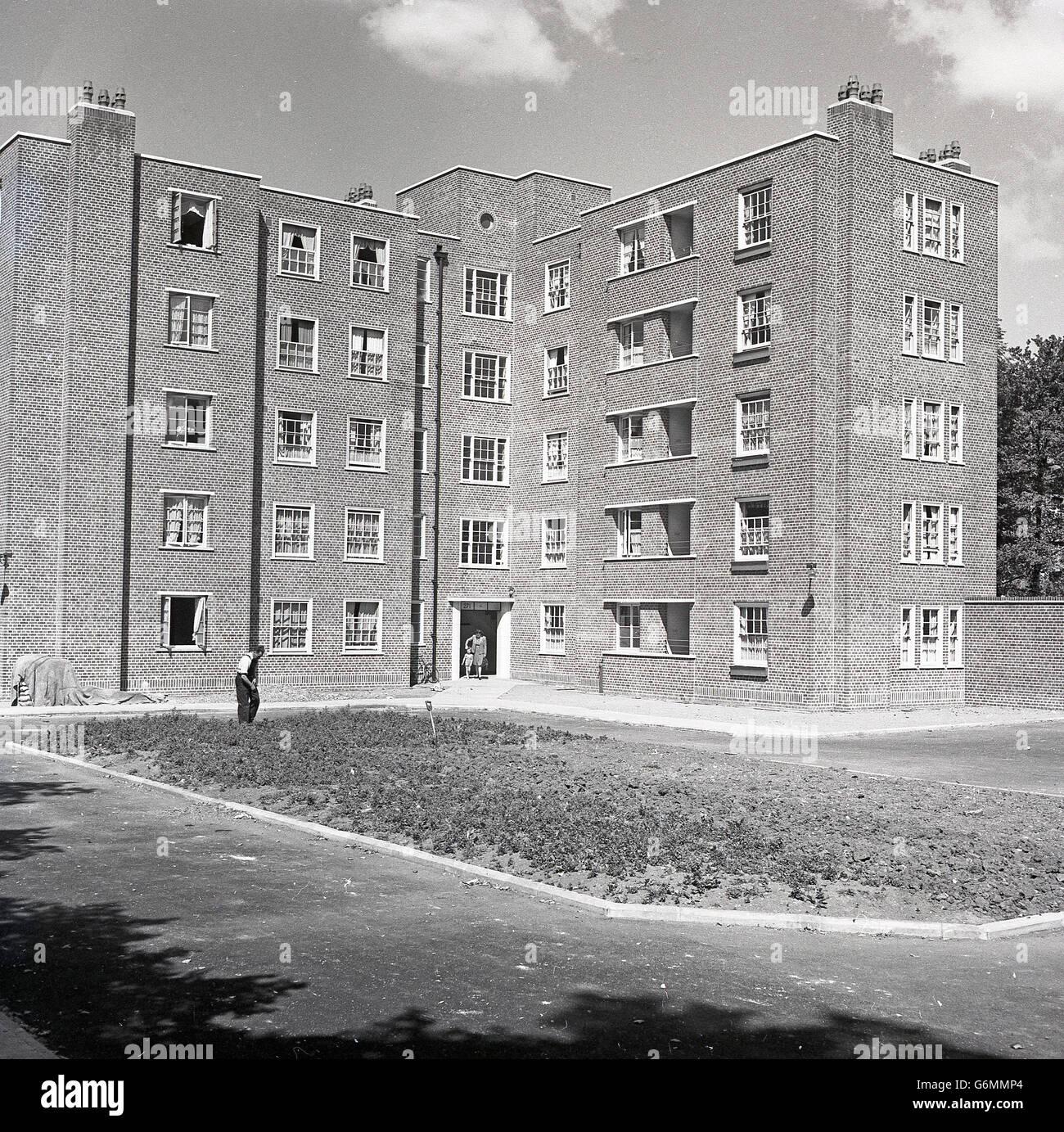 1950s, historical, exterior view of a recently completed, brick built ...