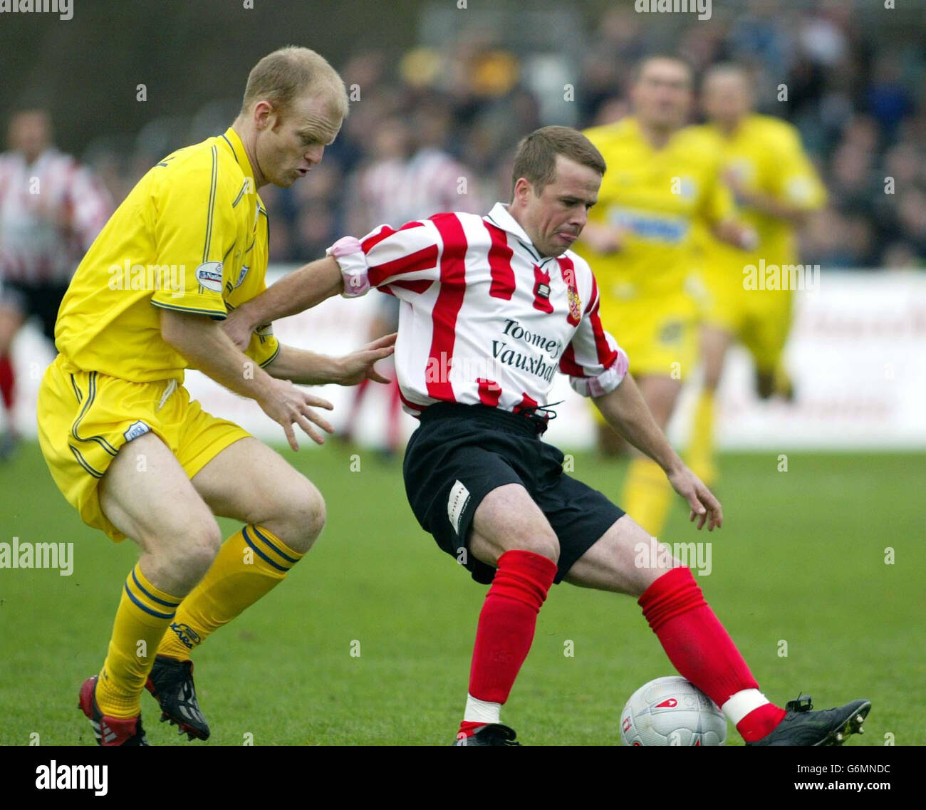 Tranmere's Sean Connelly (L) challenges Hornchurch's Jon Keeling during ...