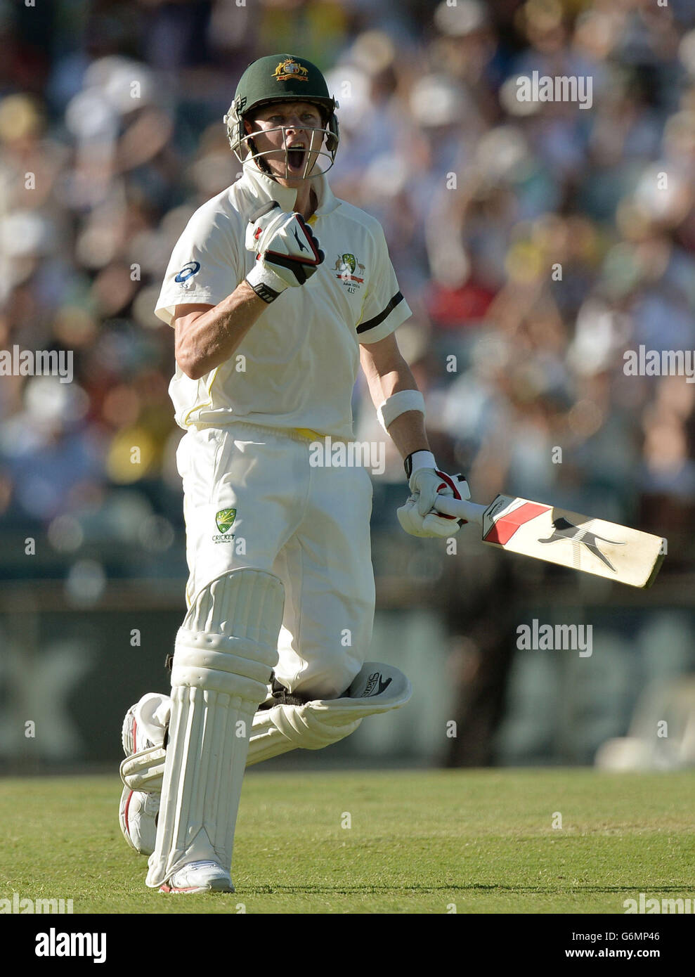 Australia's Steven Smith celebrates scoring 100 not out during day one ...