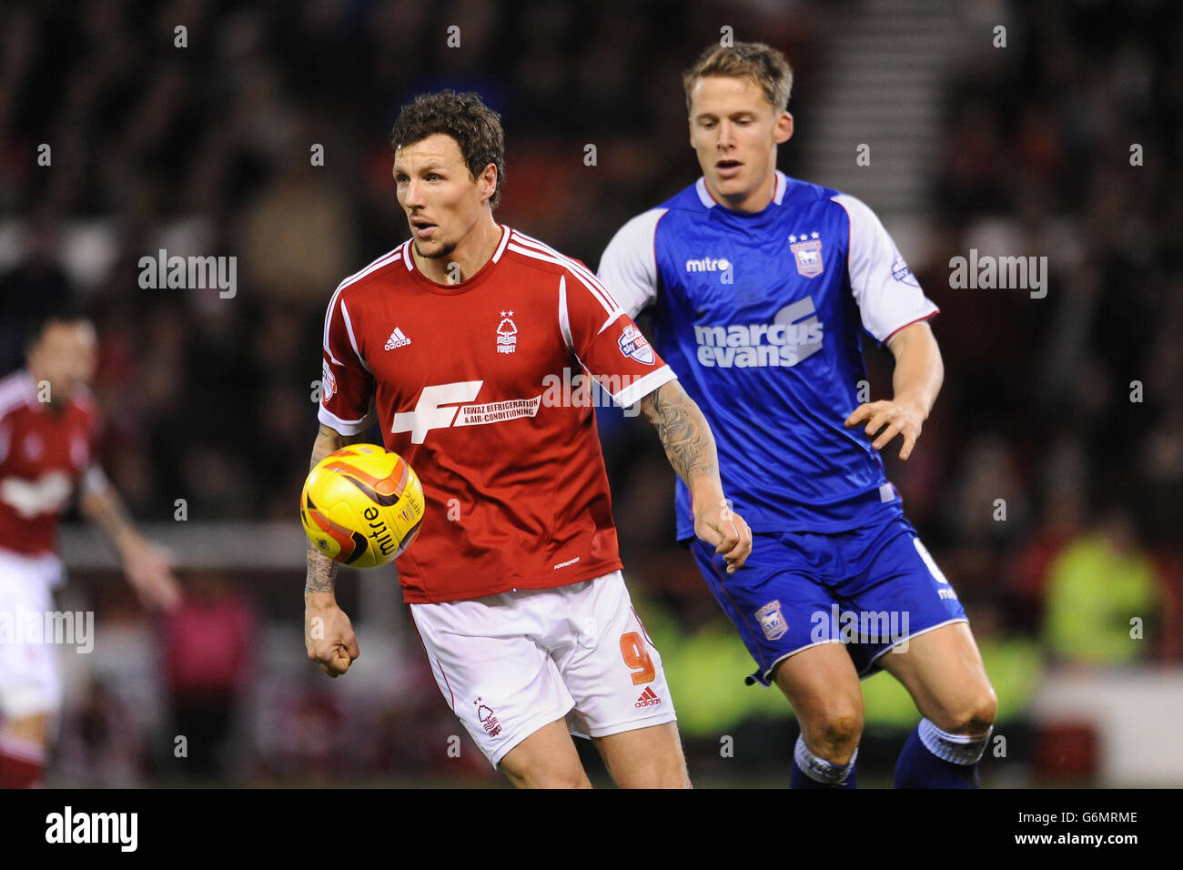 Nottingham Forest's Darius Henderson (left) and Ipswich Town's ...