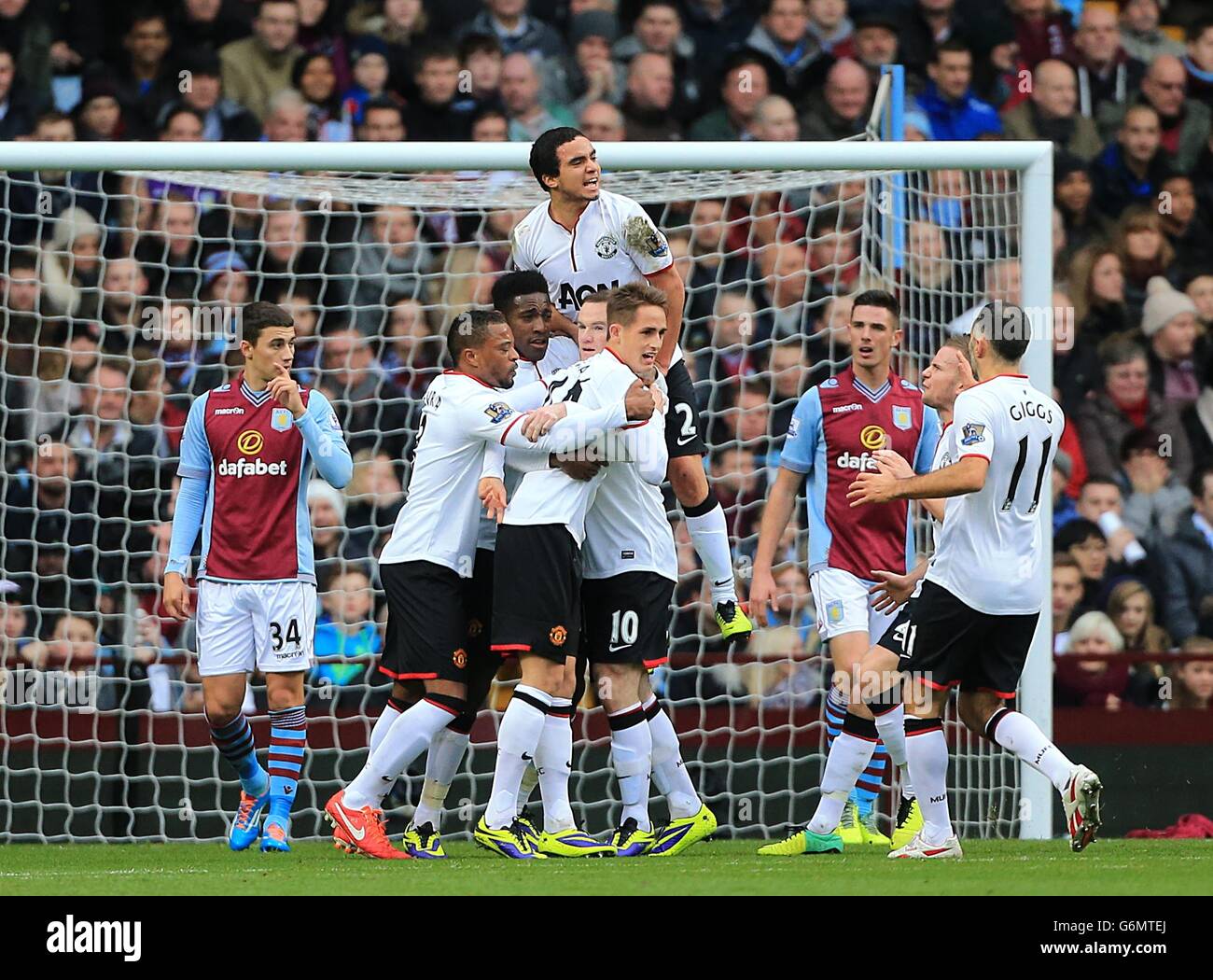 Manchester United's Danny Welbeck (centre left) celebrates scoring his ...