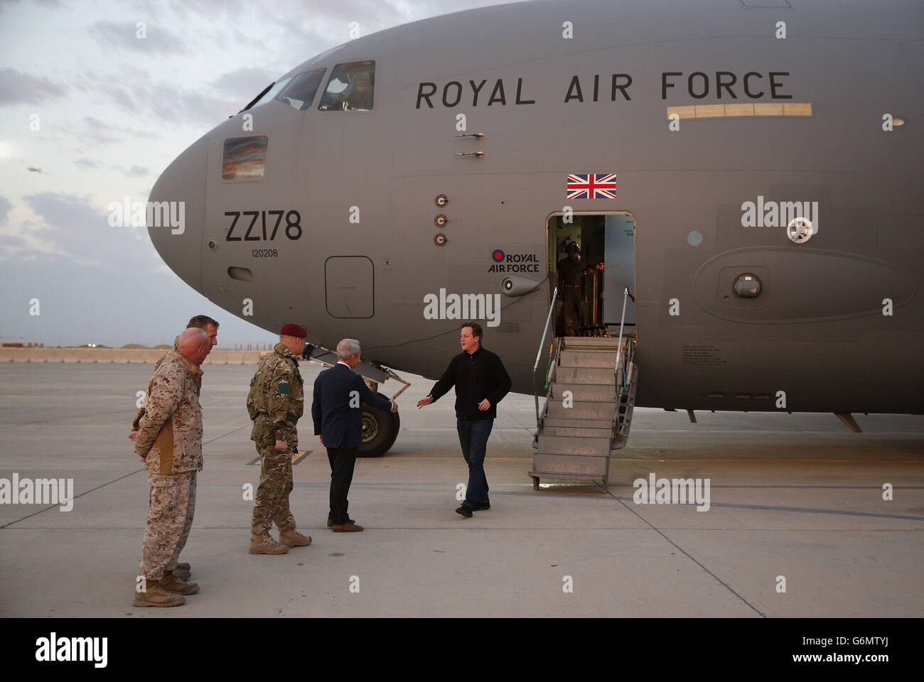 Prime Minister David Cameron (right), arrives at Camp Bastion, outside ...