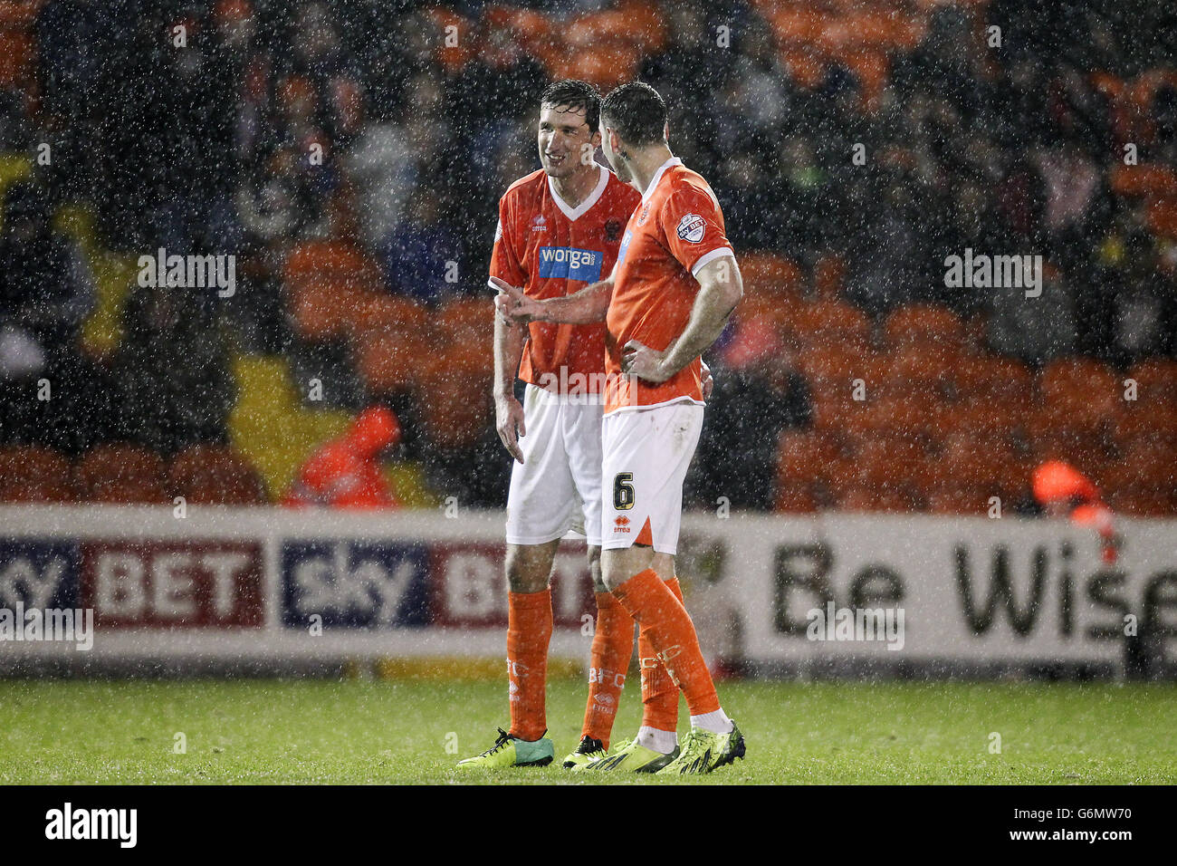 Blackpool's Chris Basham and Kirk Broadfoot (right) in the rain Stock ...