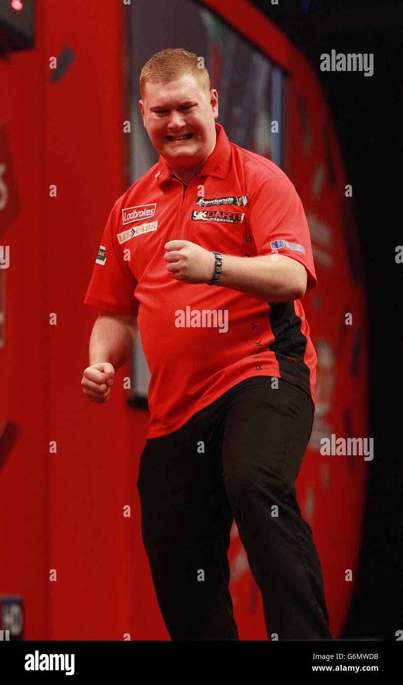 Ricky Evans celebrates his win over Ronnie Baxter during day four of ...