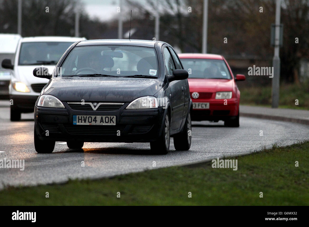 Car stock. Cars drive round the perimeter road at Heathrow Airport ...