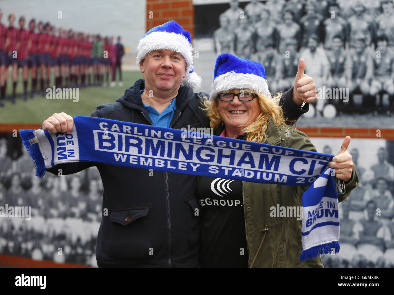 Birmingham city fans pose for a photograph outside goldsands stadium hi ...