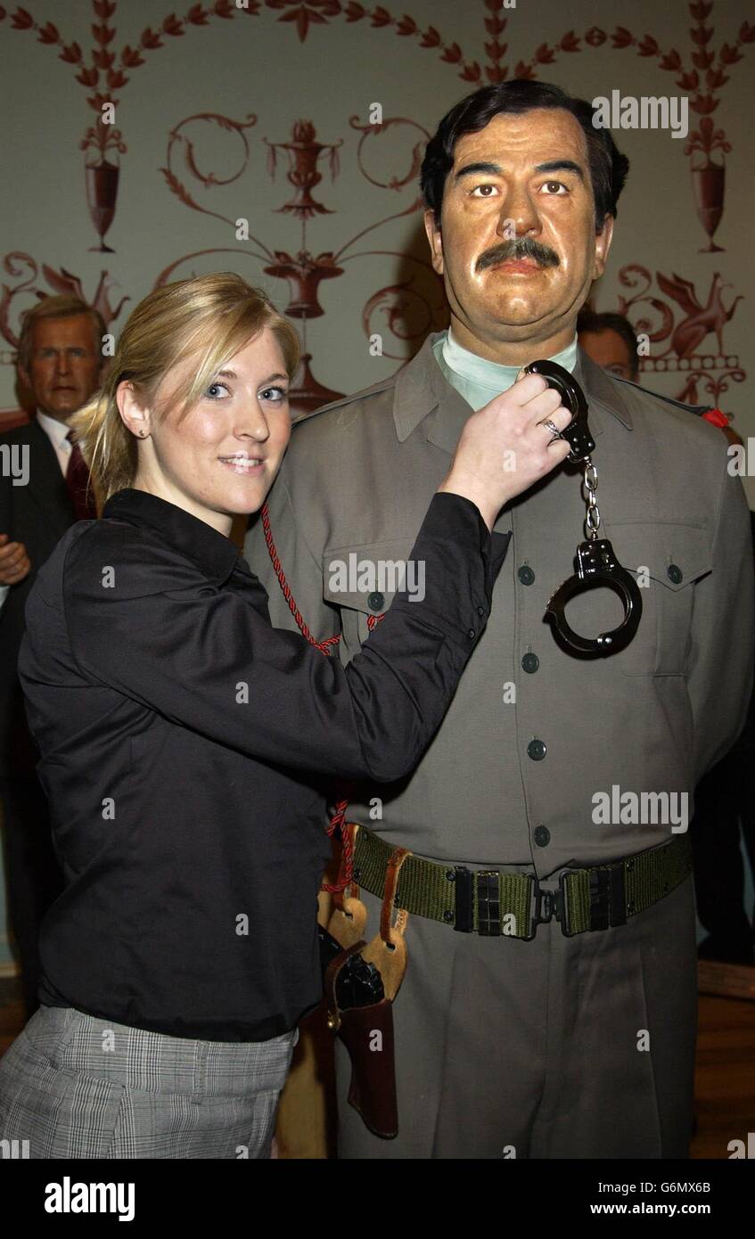 Visitor Sam Ratcliffe, 23, from London gets ready to apply some ...