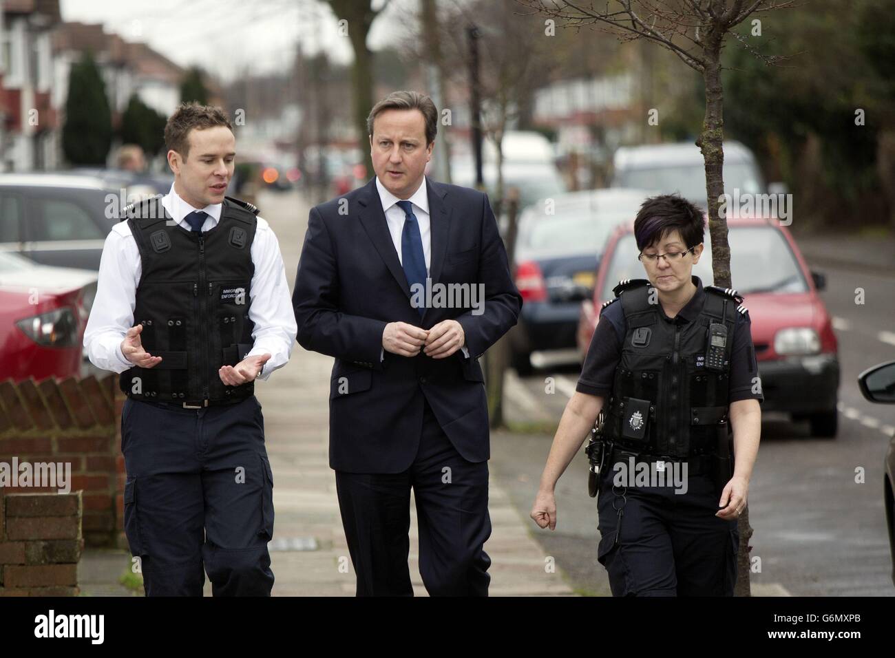 Cameron sees 'beds and sheds' raid scene Stock Photo - Alamy