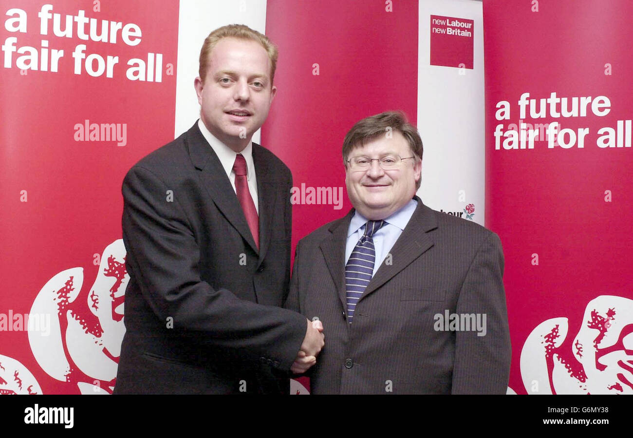 New Labour Party General Secretary Matt Carter, (left) is congratulated ...