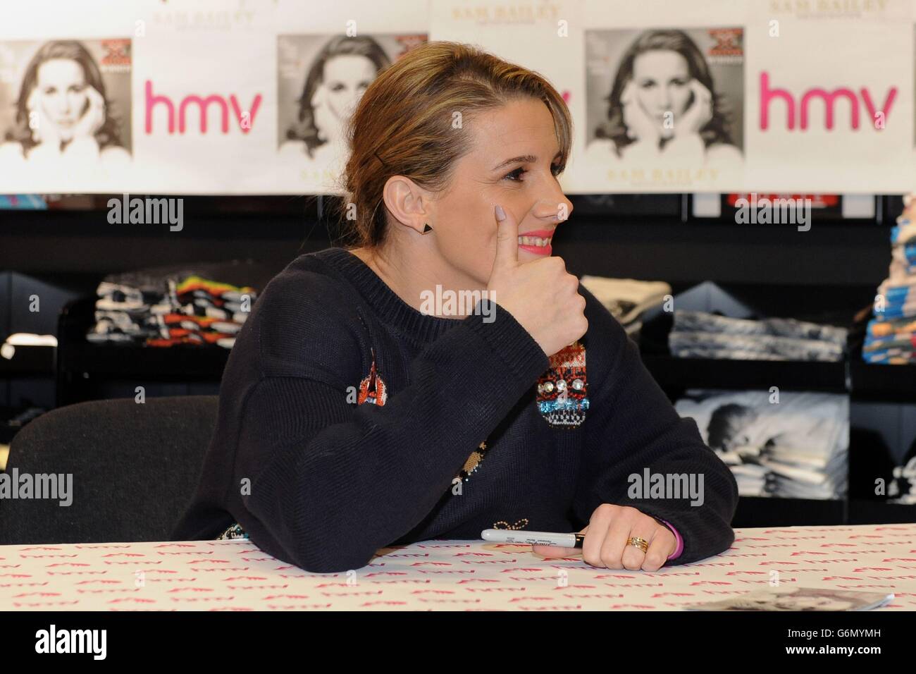 X Factor winner Sam Bailey signs copies of her new single at an HMV ...