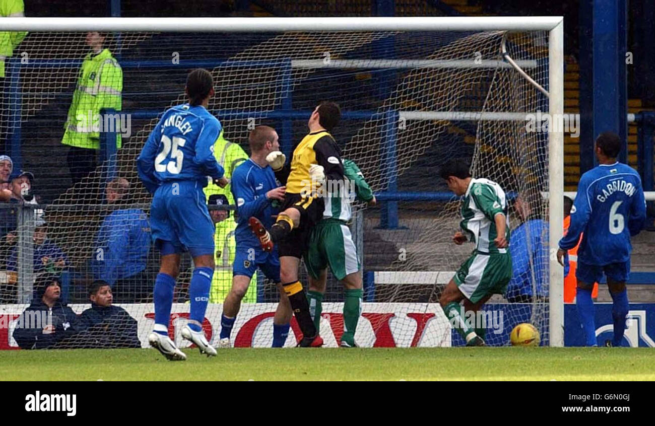 Cardiff City's goalkeeper Neil Alexander is left stranded and beaten by ...