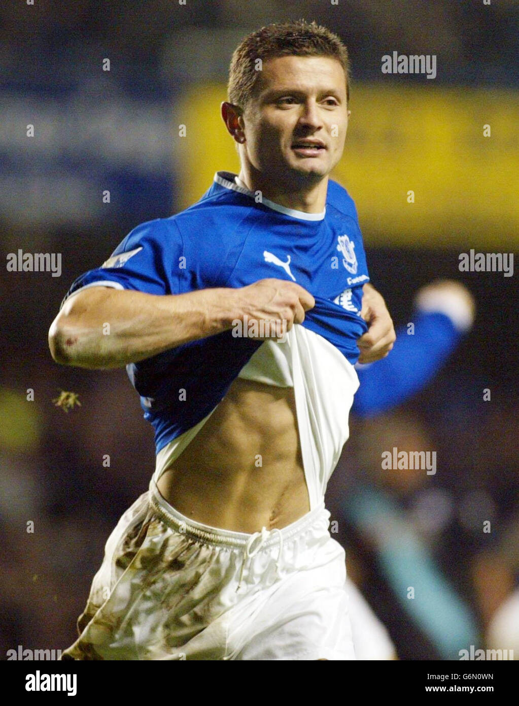 Everton's Tomasz Radzinski celebrates scoring the winner against ...
