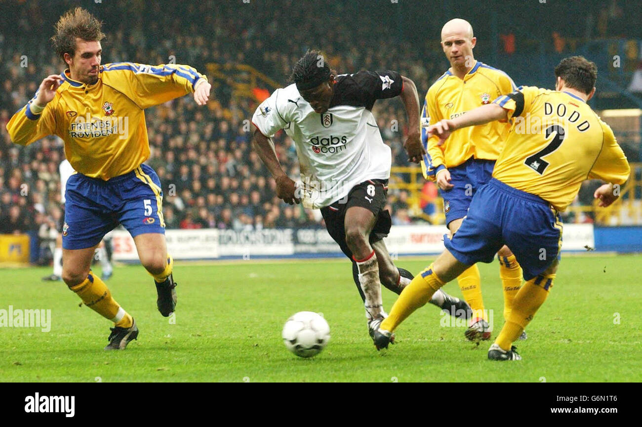 Fulham's two goal hero Louis Saha skips through the Southampton defence ...