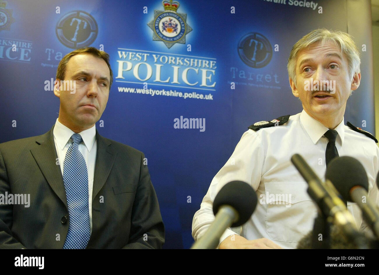 West Yorkshire Police's Chief Constable Colin Cramphorn (right) and ...