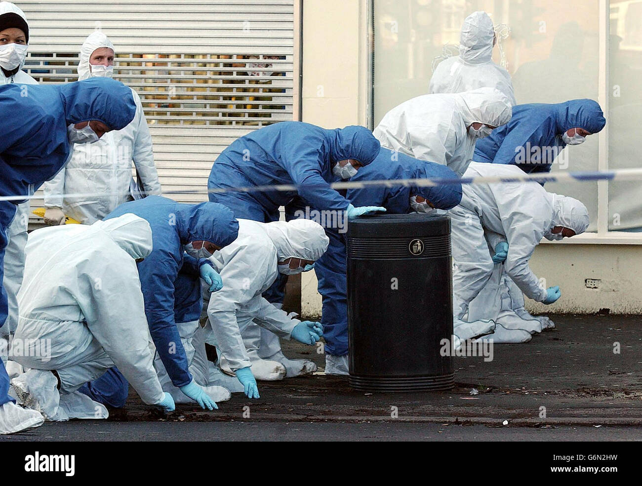 Searching the crime scene Stock Photo: 107413205 - Alamy