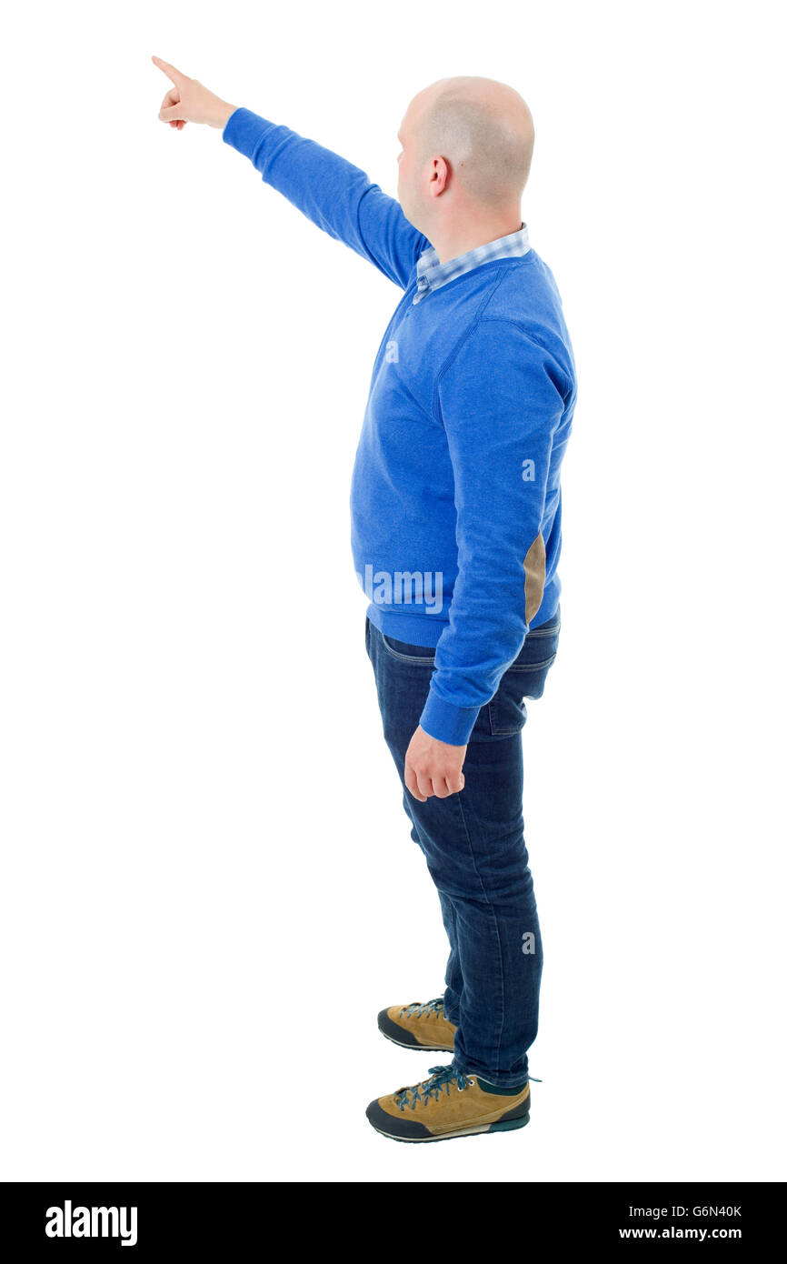 young casual man full body, pointing, isolated on a white background ...