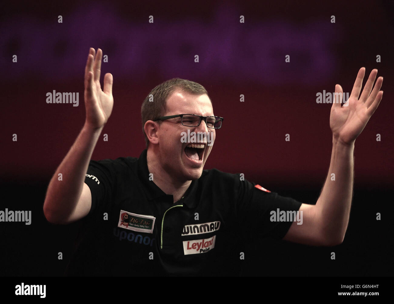 Mark Webster celebrates winning against Raymond van Barneveld during ...