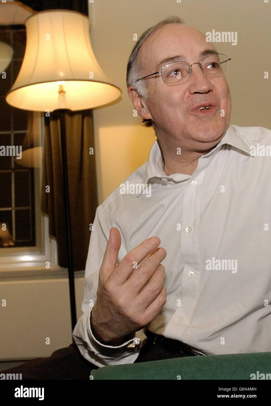 Michael Howard relaxes in his office Stock Photo - Alamy