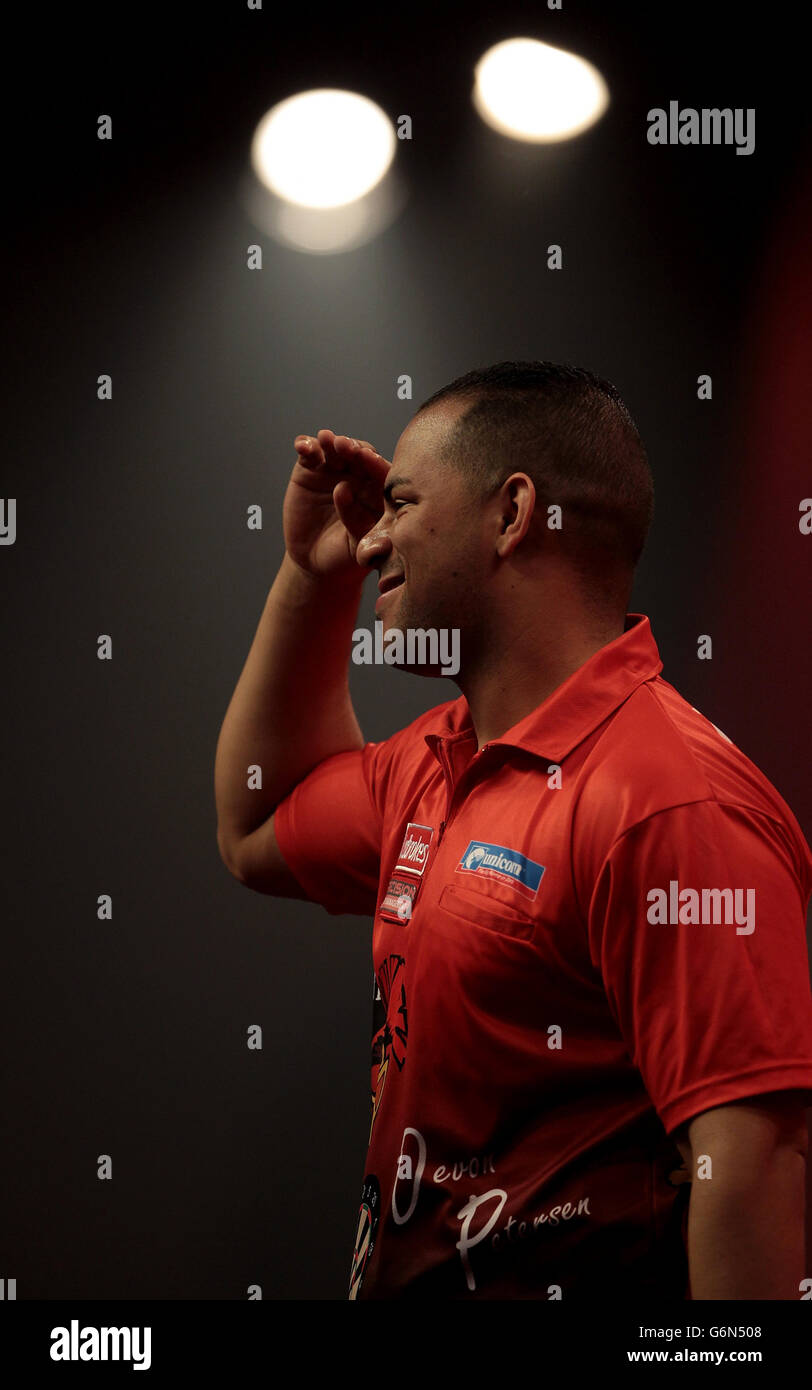 Devon Peterson salutes the crowd during his match against James Wadein ...