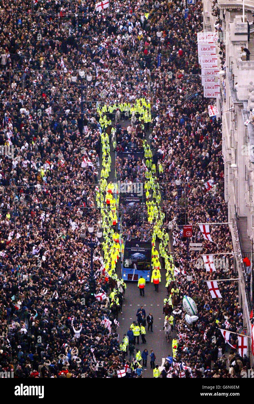 The England rugby team parade through the streets of London on an two ...