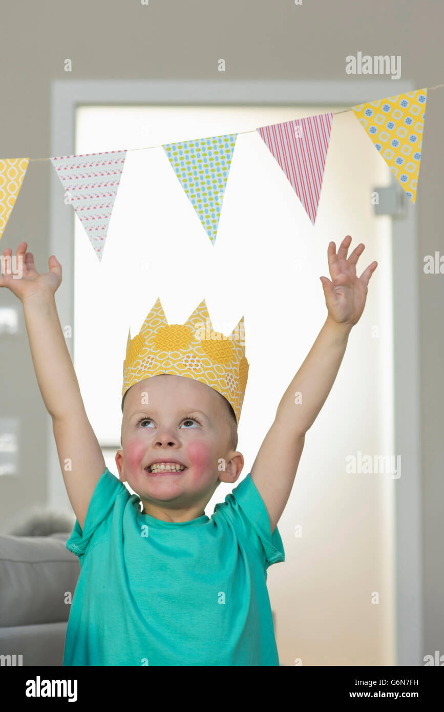 Happy boy wearing paper crown Stock Photo - Alamy