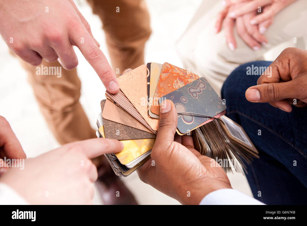 Hands with material samples, close-up Stock Photo - Alamy